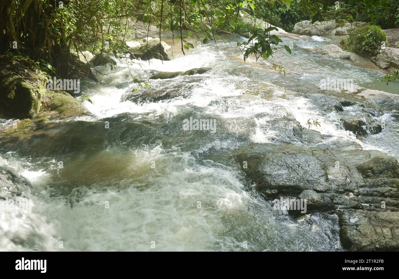 water falling on river pass rock and stone at north Chet Kod waterfall ...