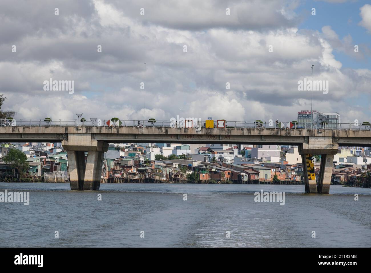 Bridge over Saigon River, Lower-class Shanty Housing in Background ...