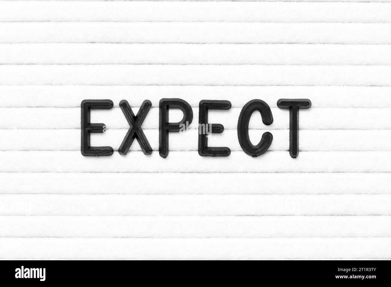 Black color letter in word expect on white felt board background Stock ...