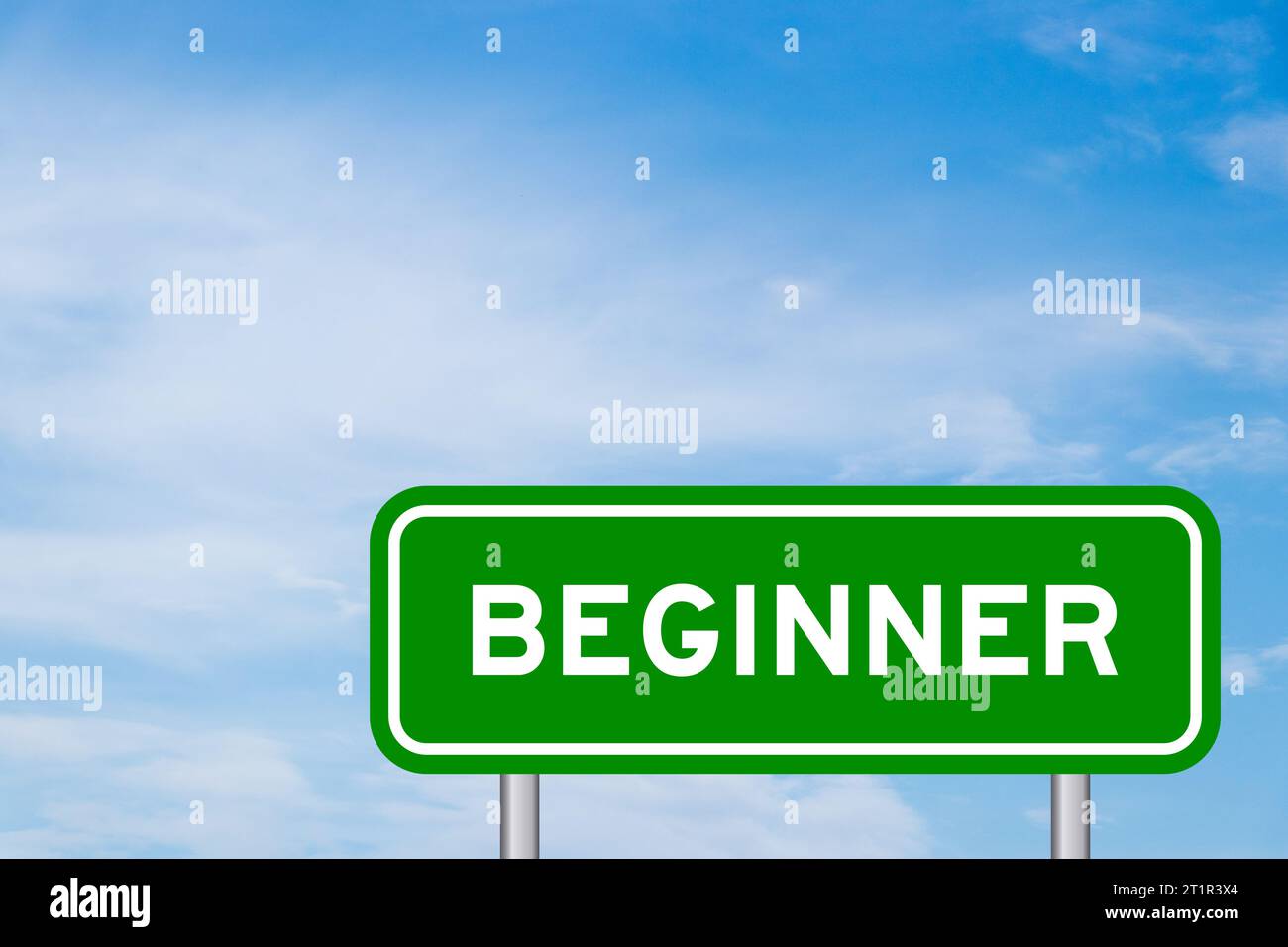Green color transportation sign with word beginner on blue sky with ...