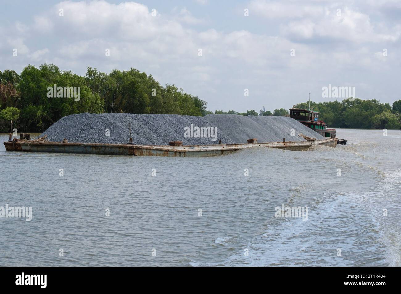Barge Transporting Gravel on the Saigon River, Vietnam Stock Photo - Alamy