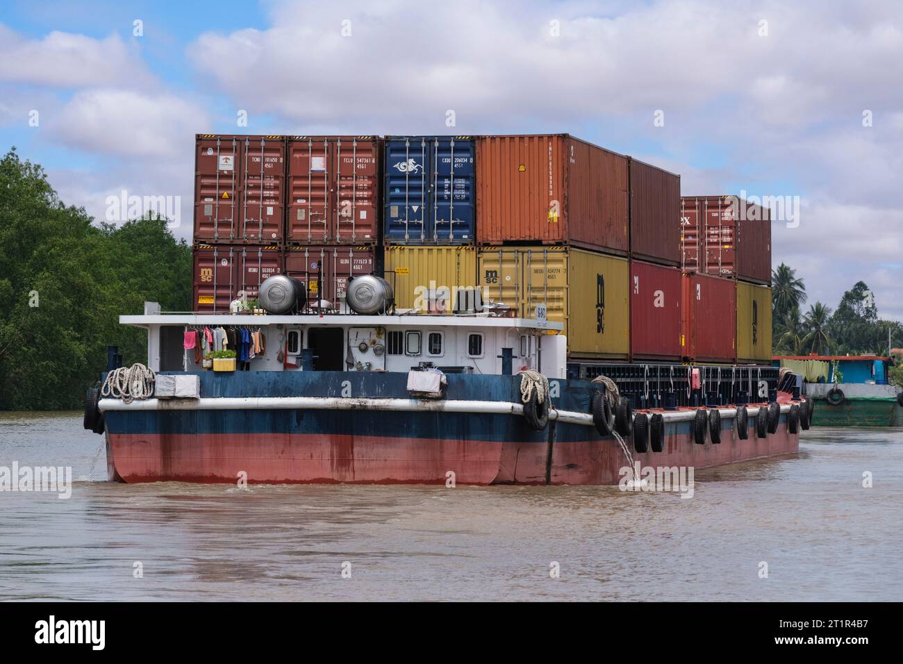 Barge with Cargo Containers on the Mekong River, Vietnam Stock Photo ...