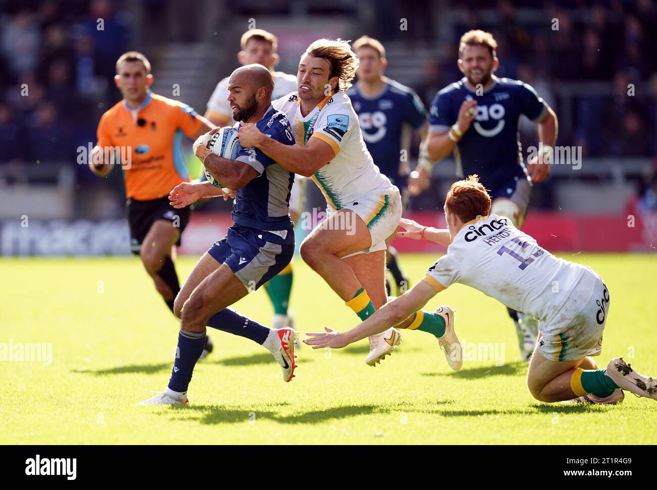 Sale Sharks' Tom O'Flaherty is tackled by Northampton Saints' James ...