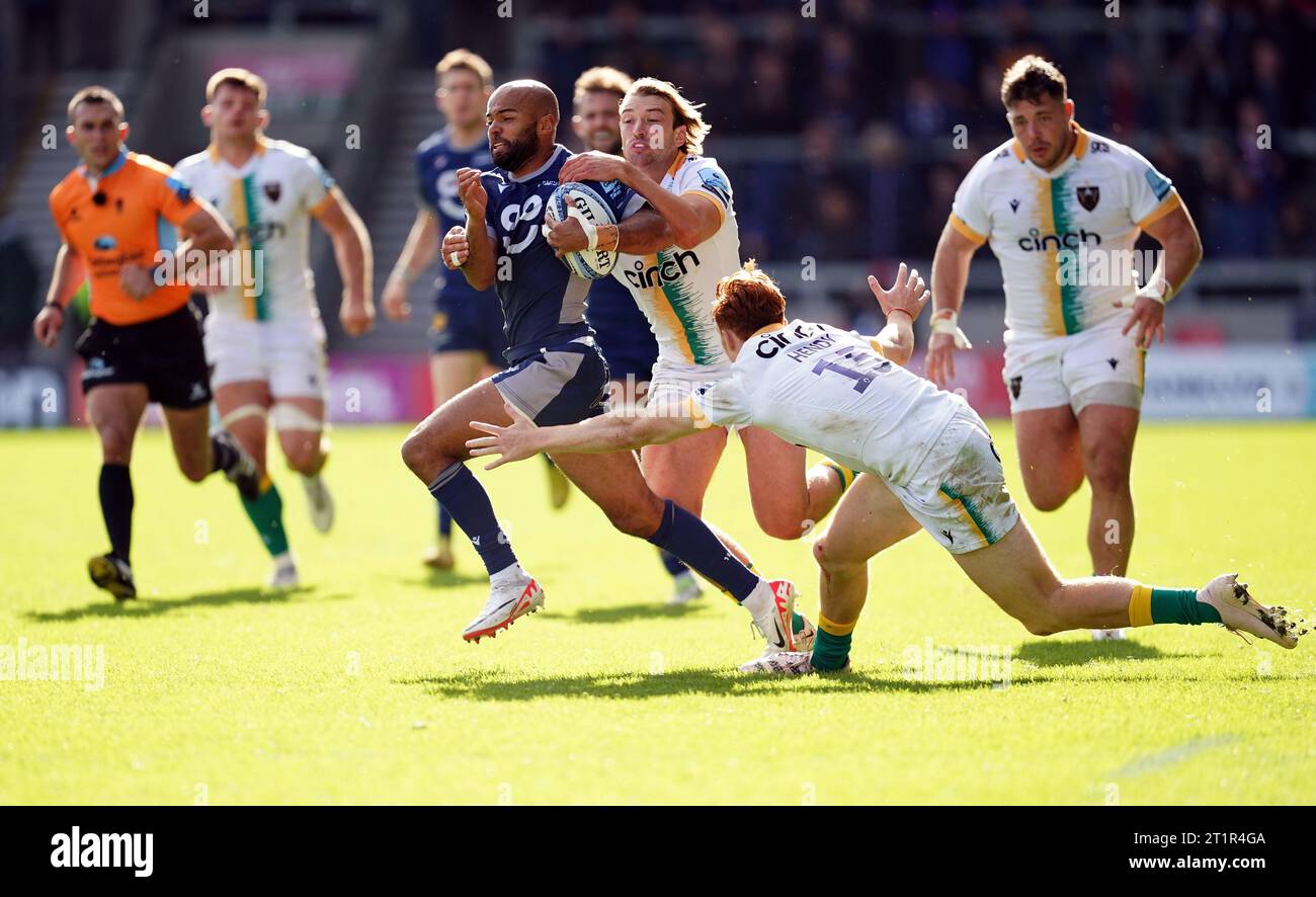 Sale Sharks' Tom O'Flaherty is tackled by Northampton Saints' James ...