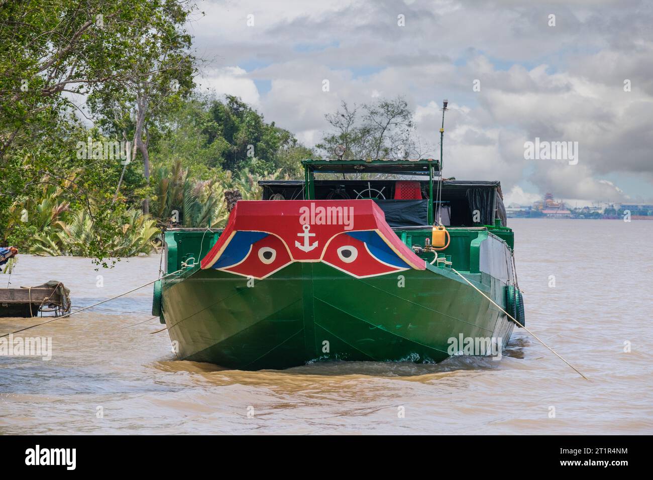 River Traffic on Mekong River, Vietnam. Black Eyes in White Circle on ...