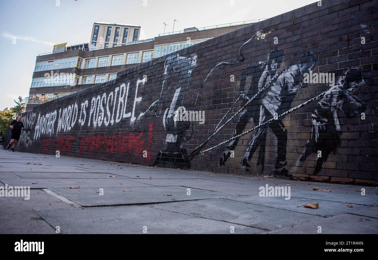 London, UK. 14th Oct, 2023. A pedestrian walk past the potential new ...