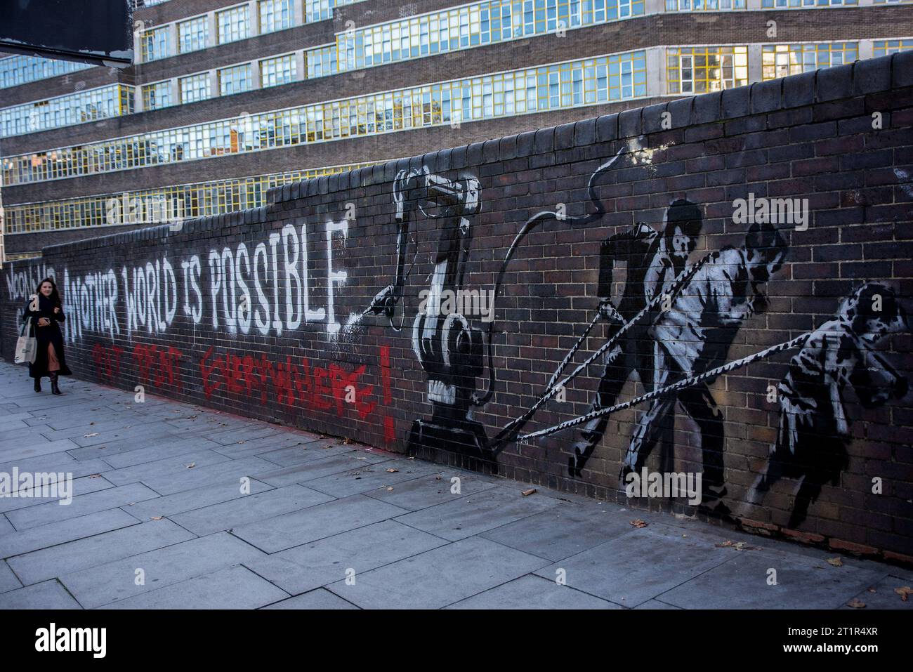 London, UK. 14th Oct, 2023. A pedestrian walks by the potential new ...