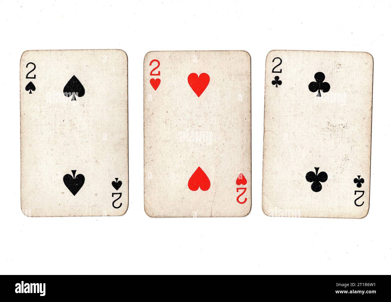 Vintage playing cards featuring three twos on a white background Stock ...