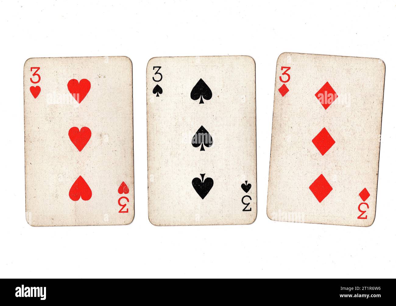 Vintage playing cards featuring three threes on a white background ...