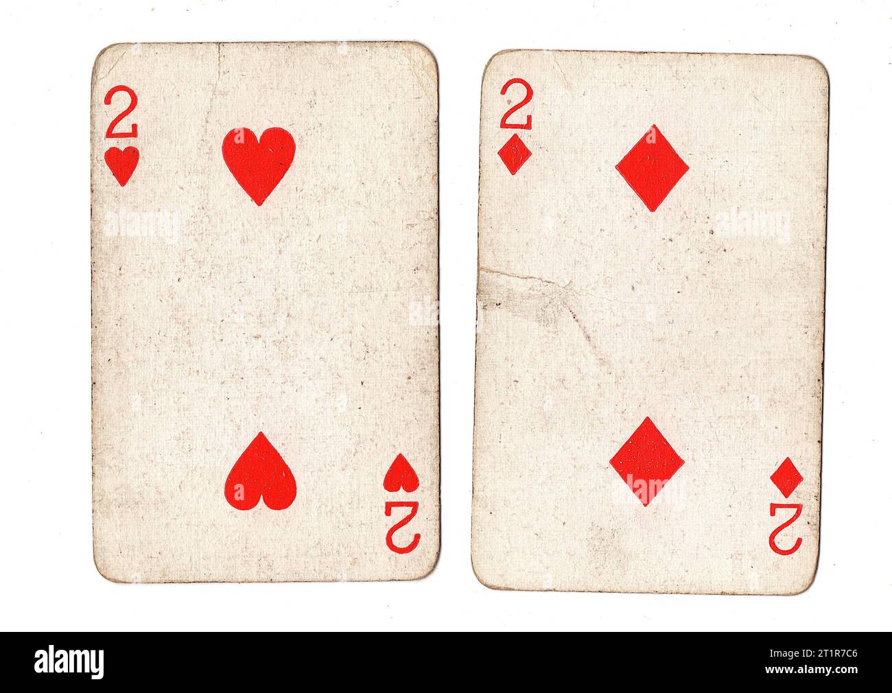Vintage playing cards featuring a pair of red twos on a white ...