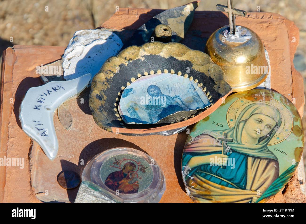 An Orthodox altar on the side of the road. There are Orthodox icons and ...