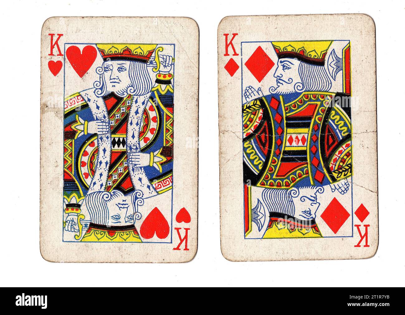 Vintage playing cards featuring a pair of red kings on a white ...
