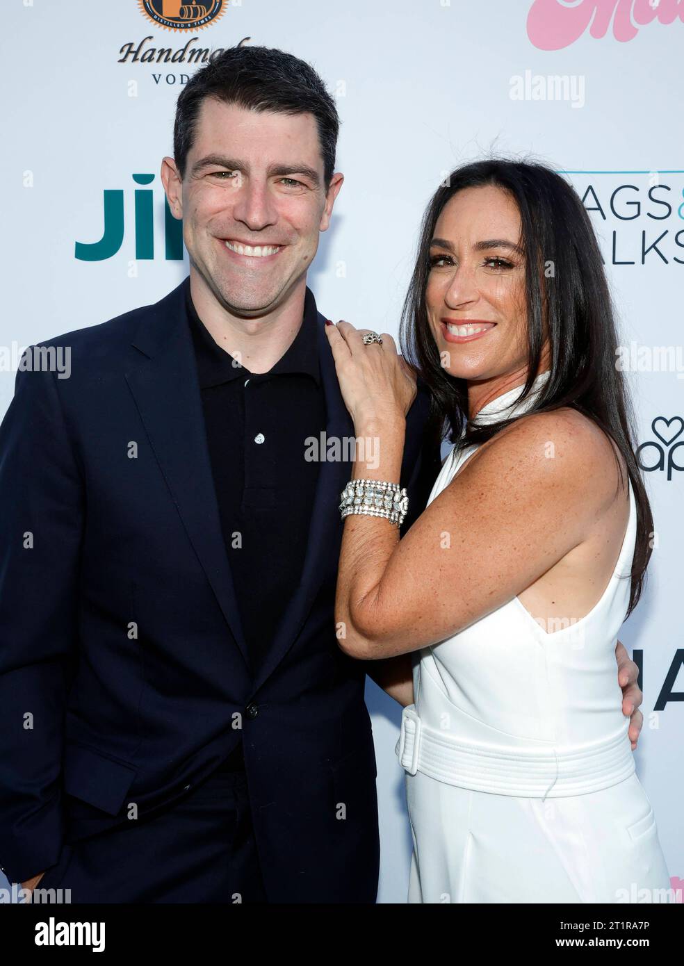 LOS ANGELES, CA - OCTOBER 14: Max Greenfield, Lesley Brog, at The Wags ...