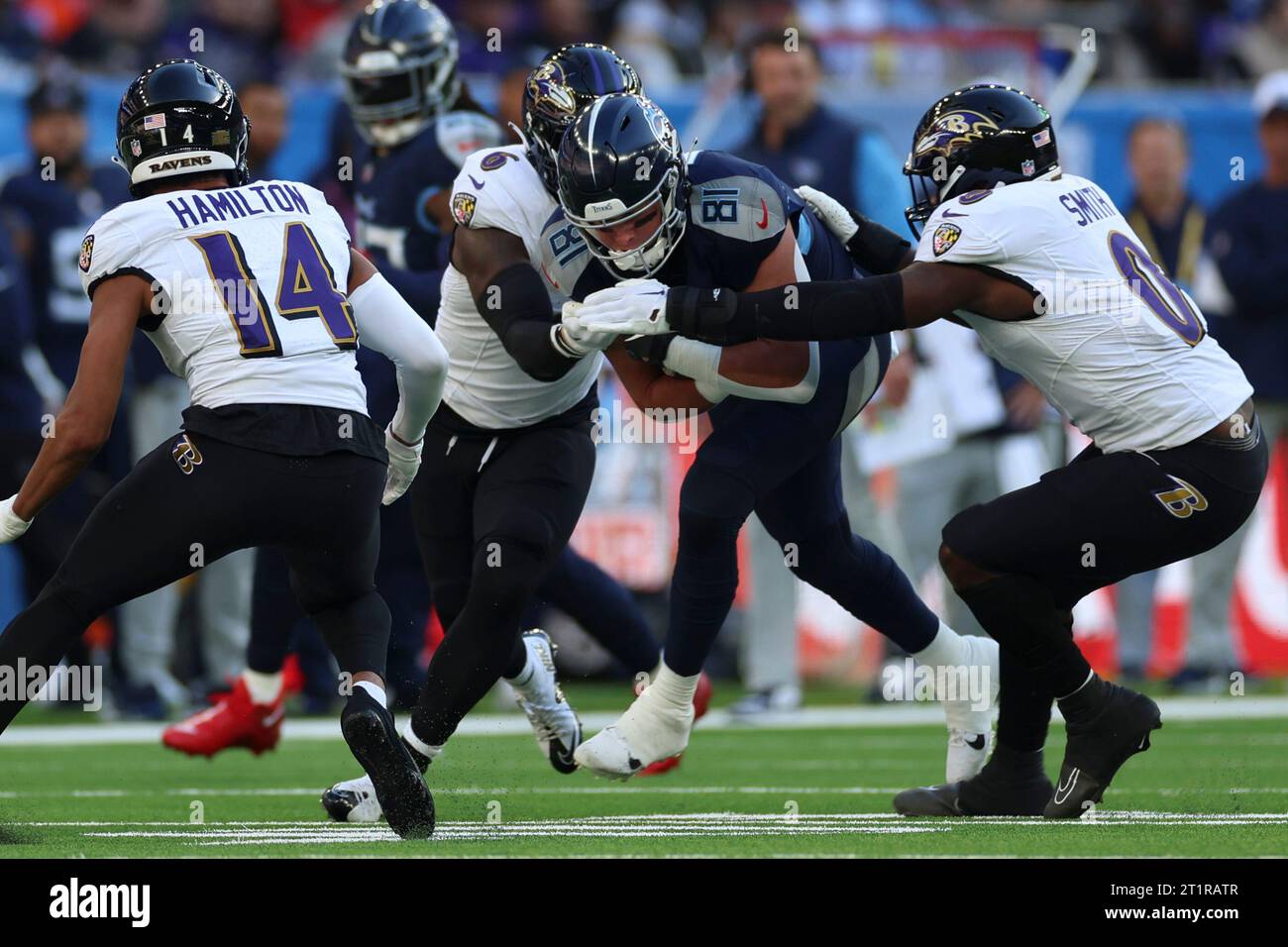 Tennessee Titans tight end Josh Whyle (81) is tackled by Baltimore ...