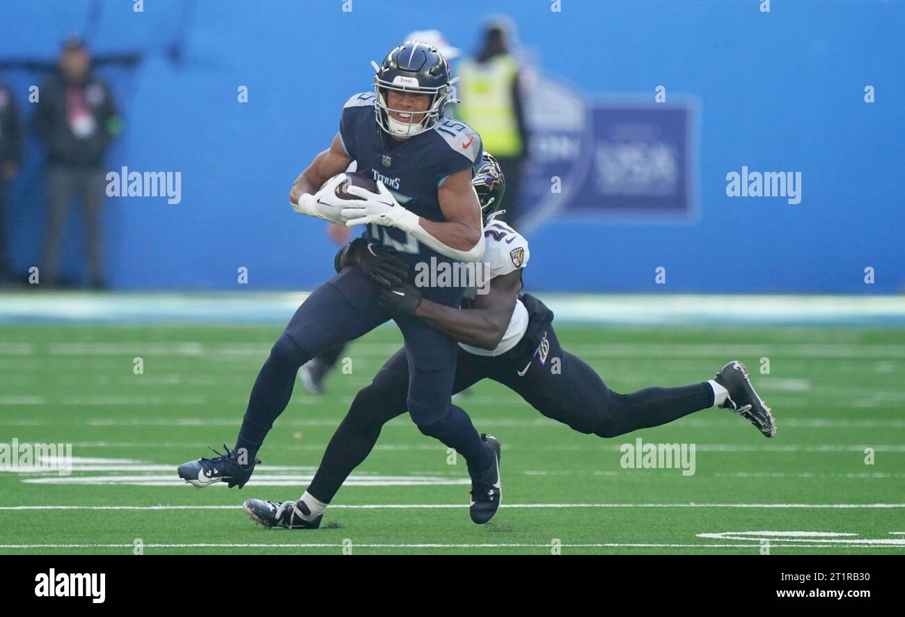 Tennessee Titans' Nick Westbrook-Ikhine is tackled by Baltimore Ravens ...
