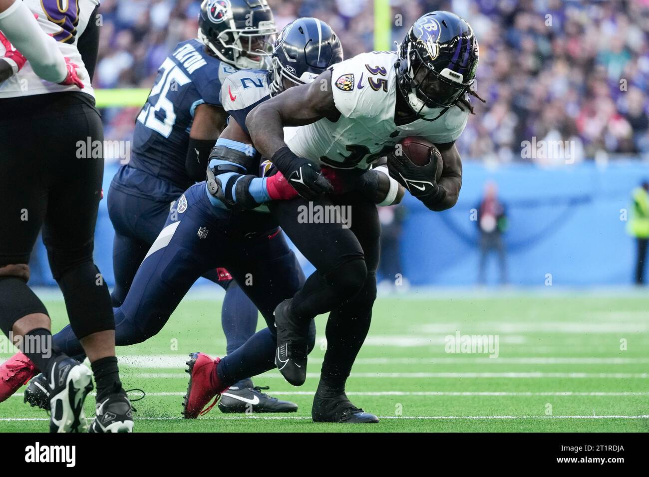 Tennessee Titans linebacker Azeez Al-Shaair (2) tackles Baltimore ...