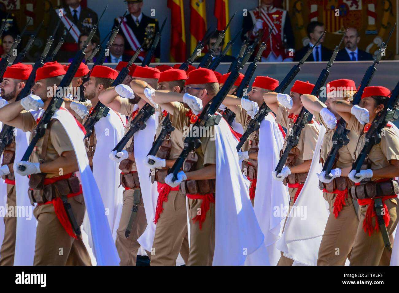 Regulares regiment from Ceuta and Melila with their white cape . Some 4,100 military personnel ...