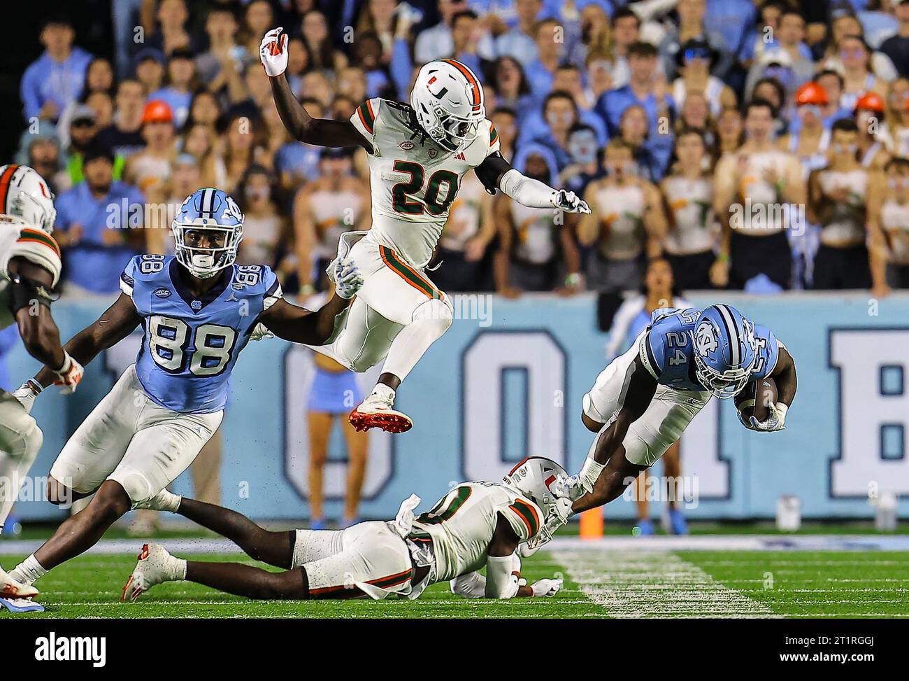 October 14, 2023: North Carolina senior British Brooks (24) gets taken ...