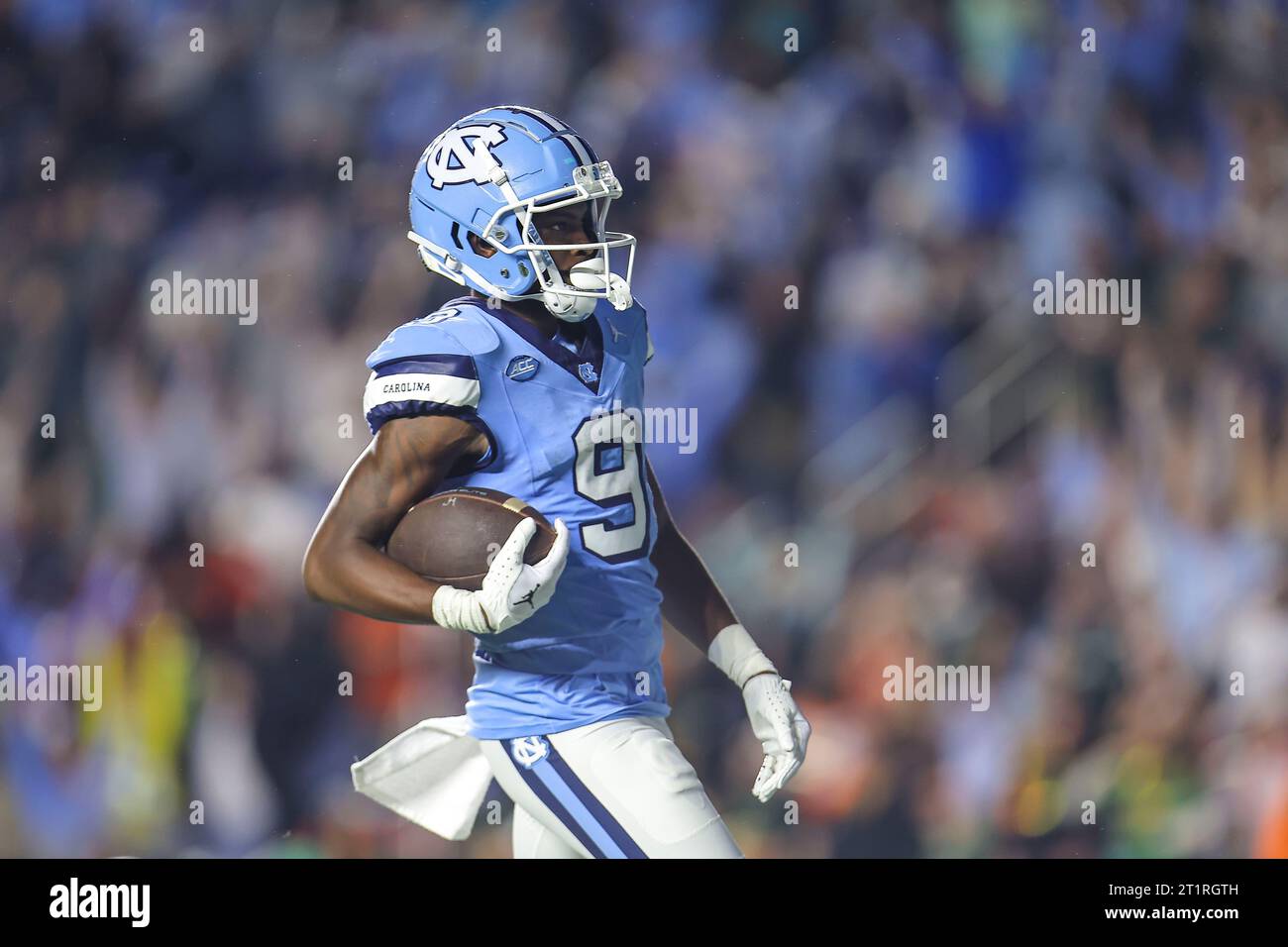October 14, 2023: North Carolina junior Devontez Walker (9) scores ...
