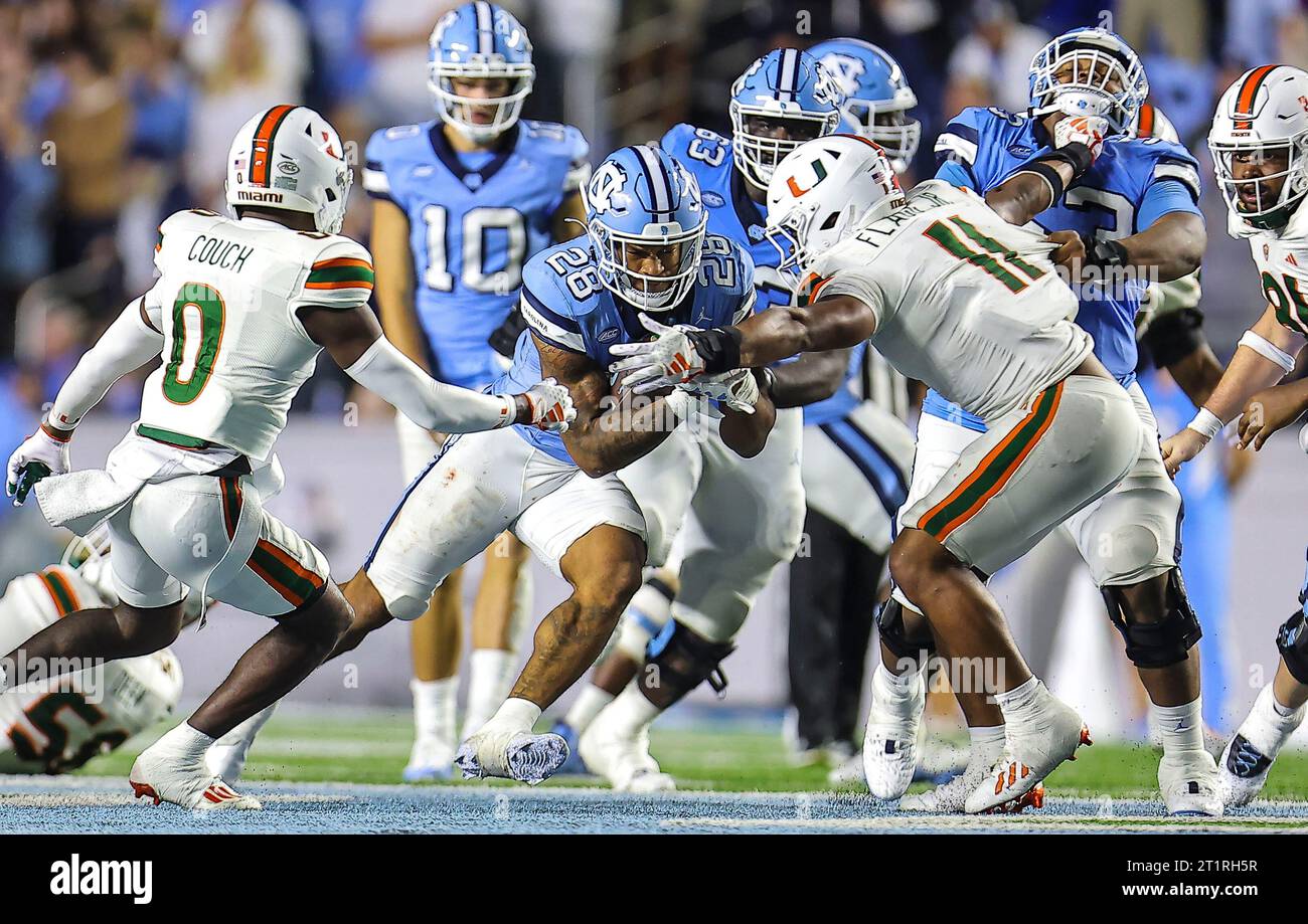 October 14, 2023: University of Miami freshman Ajay Allen (28) braces ...