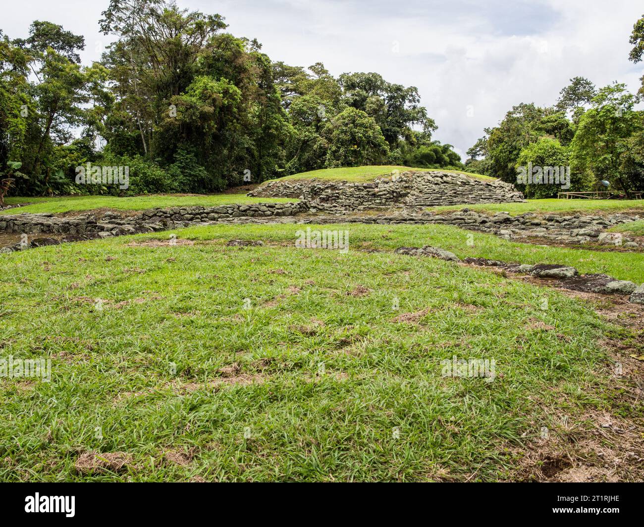 Stone mounds where once stood a wooden conical house at the Pre ...