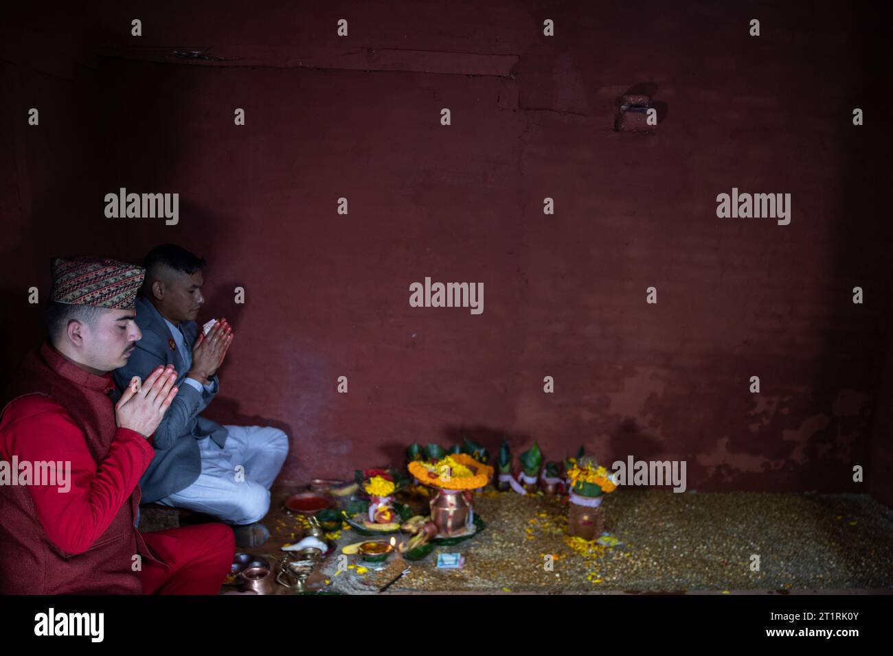Kathmandu, Nepal. 15th Oct, 2023. Priests pray before sows barley seeds ...