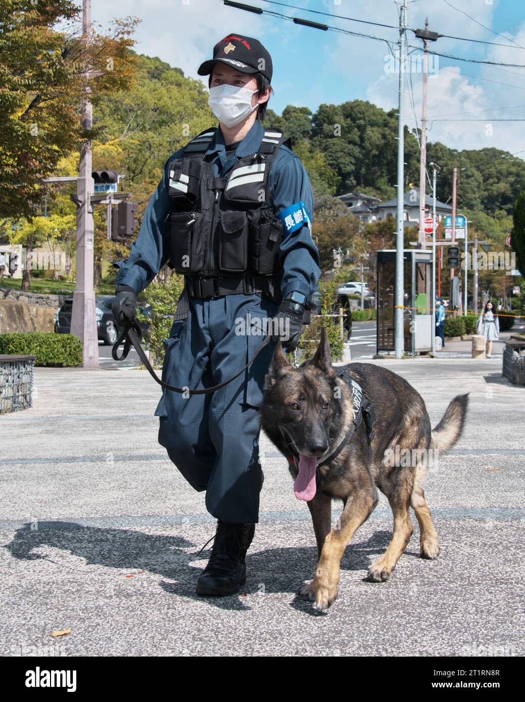 Sasebo, Japan. 15th Oct, 2023. Osaka-Prefecture police officer and ...