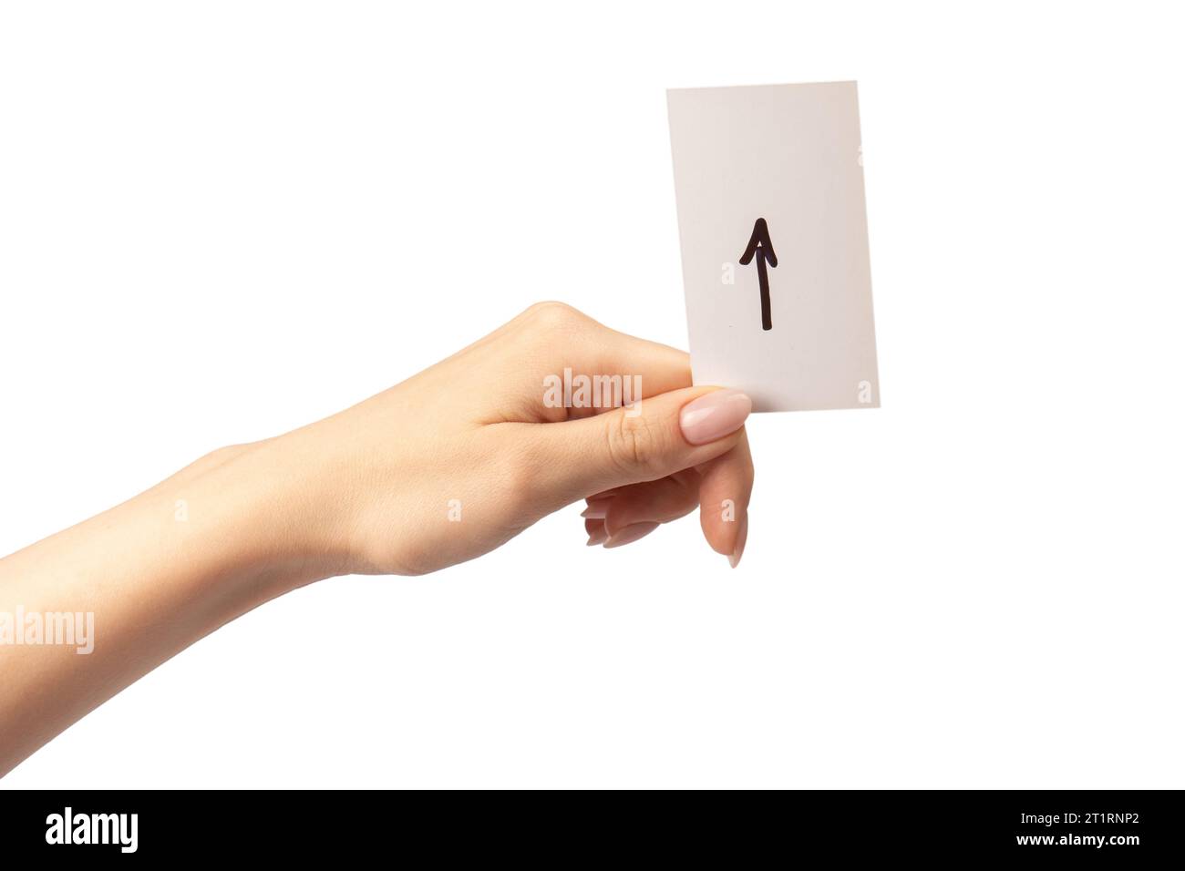 Arrow sign on a card in a woman hand isolated on a white background ...