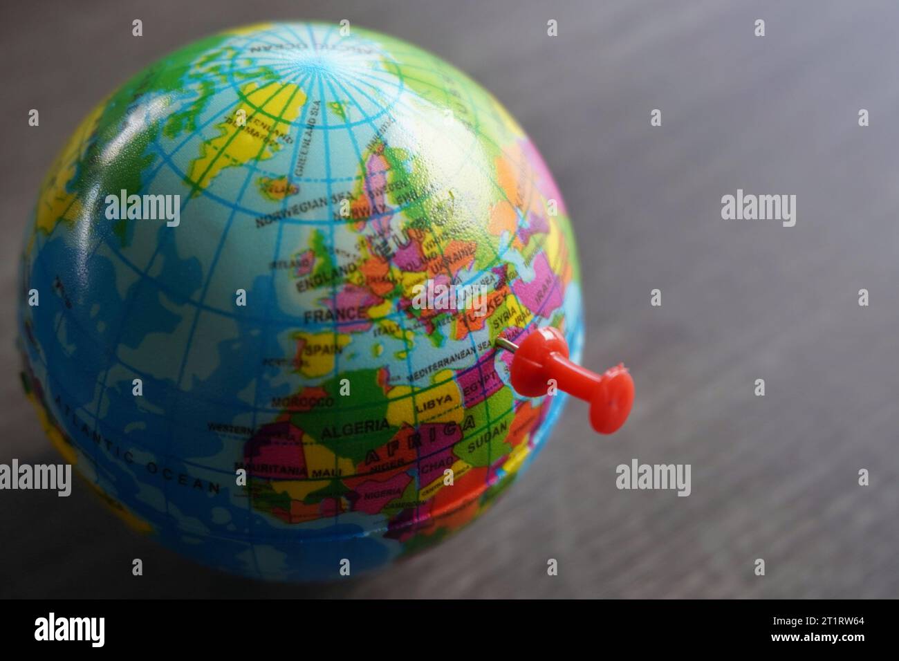 Close up image of push pin pointing at Gaza, Palestine on world globe ...