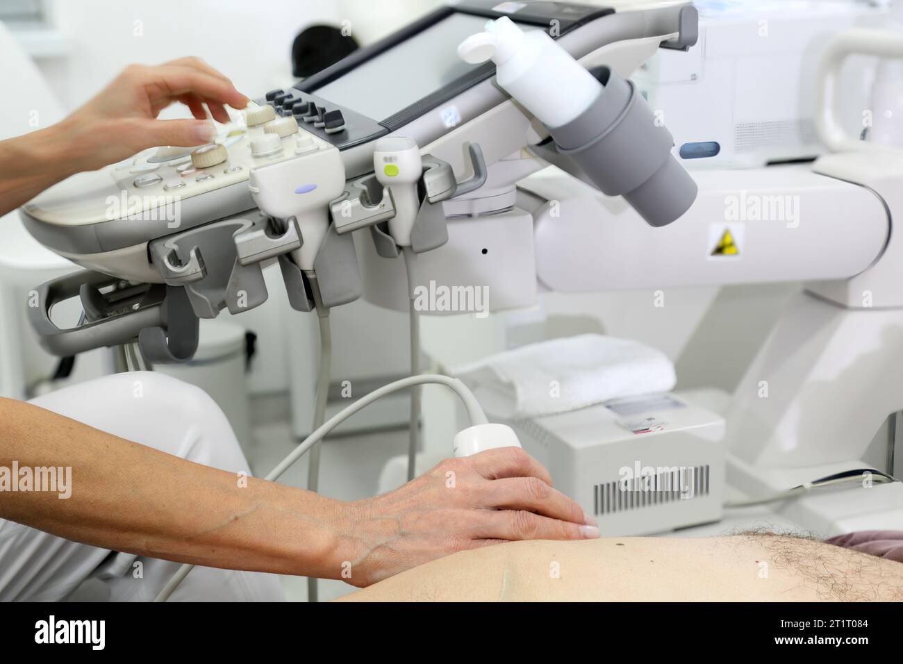 Ultrasonic examination of internal organs. A man on an abdominal ...