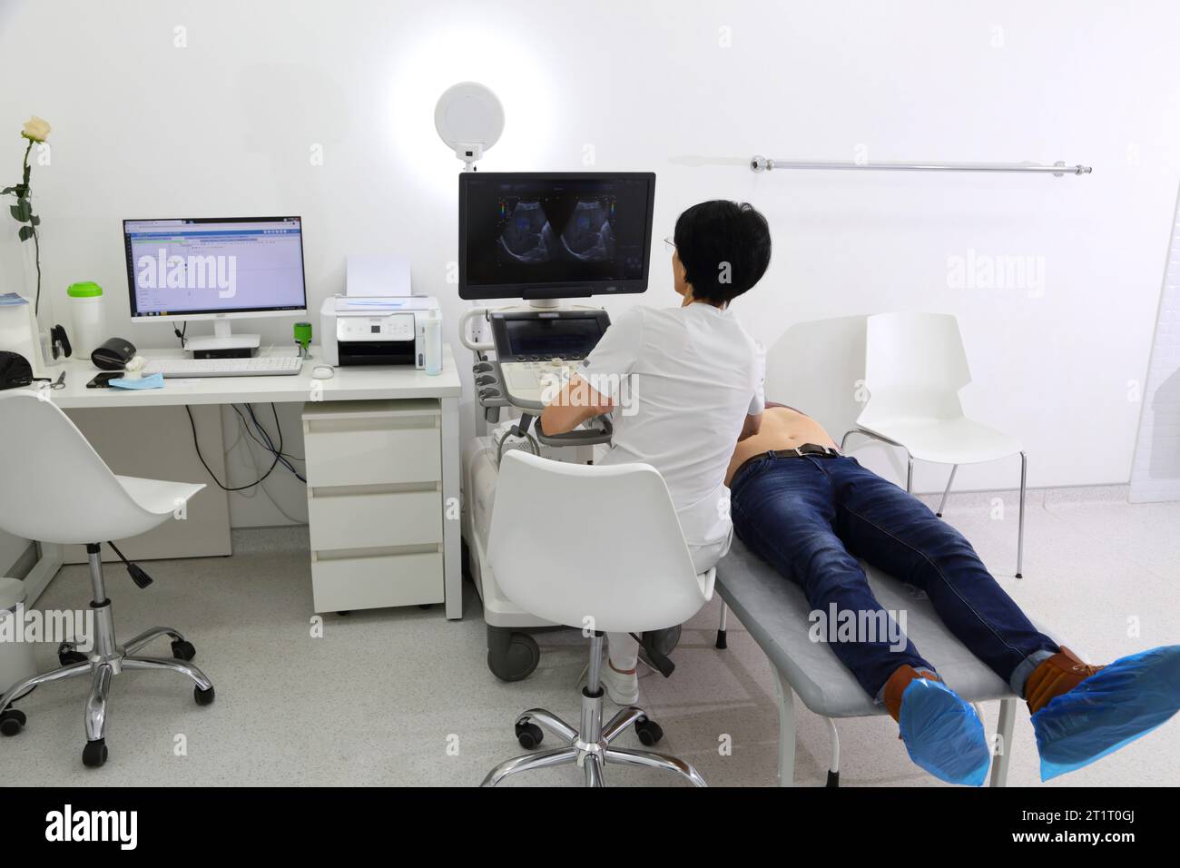 Ultrasonic examination of internal organs. A man on an abdominal ...