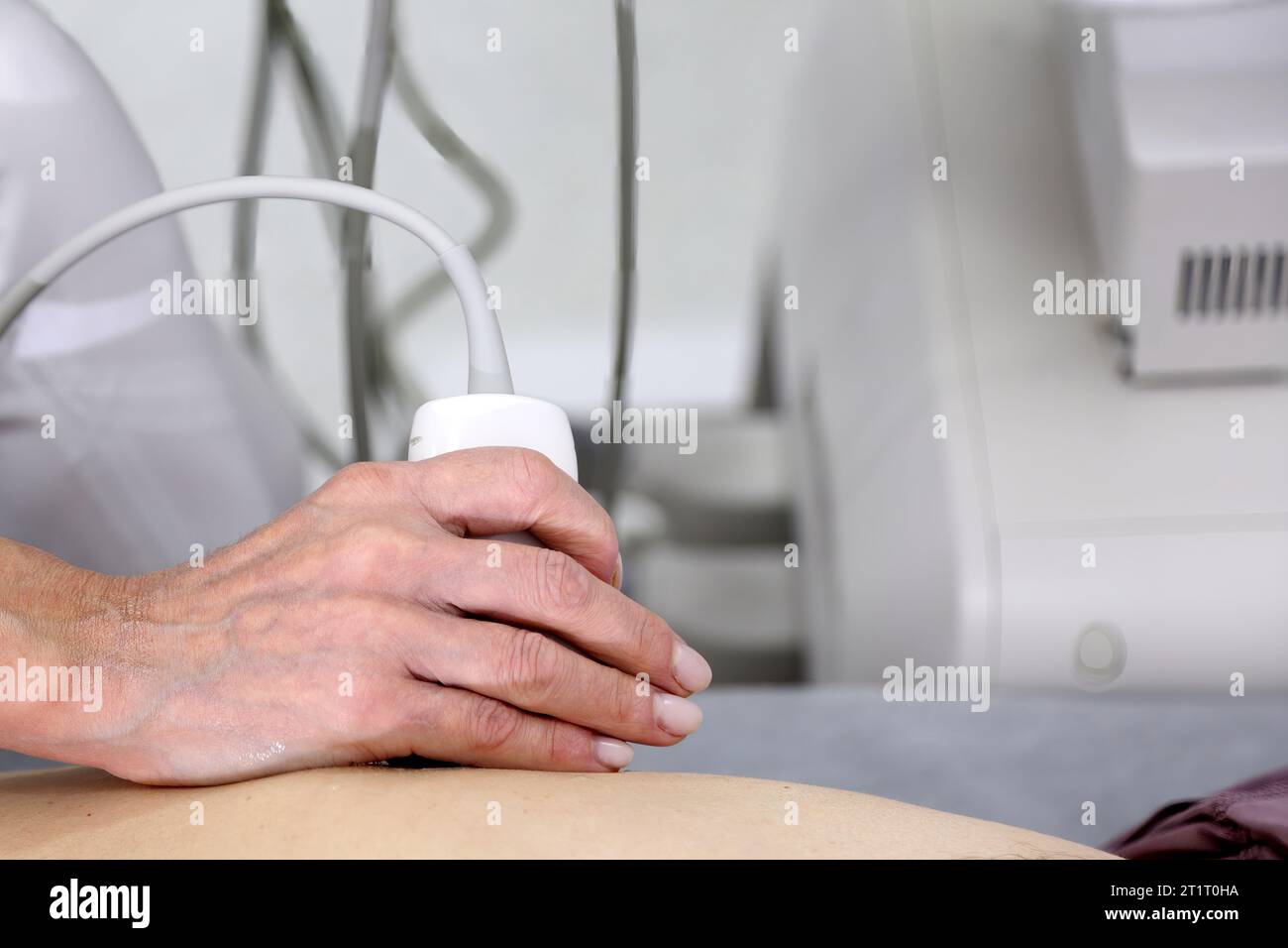 Ultrasonic examination of internal organs. A man on an abdominal ...