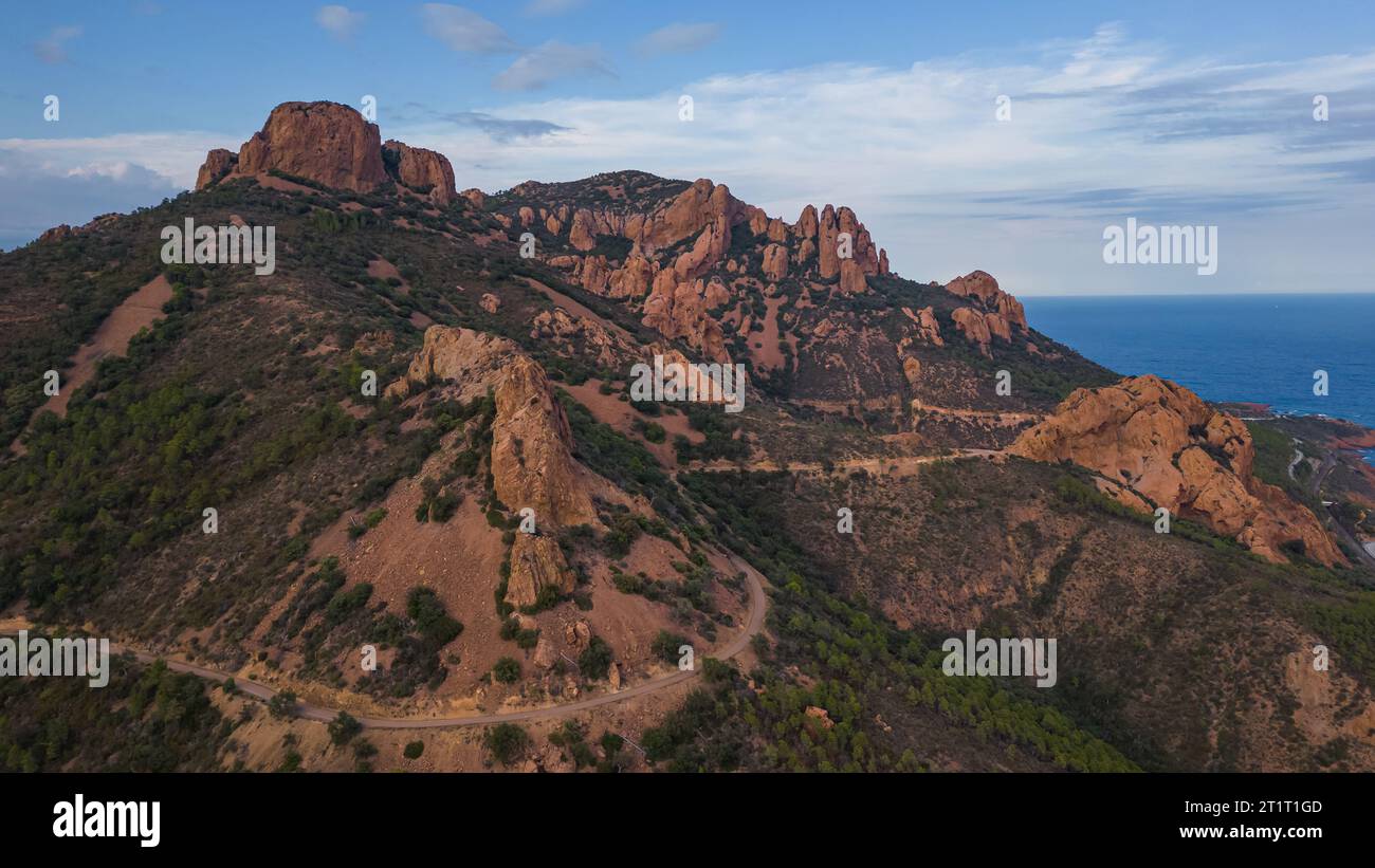 Aerial view of the Massif de L'Esterel and red cliffs falling into the ...