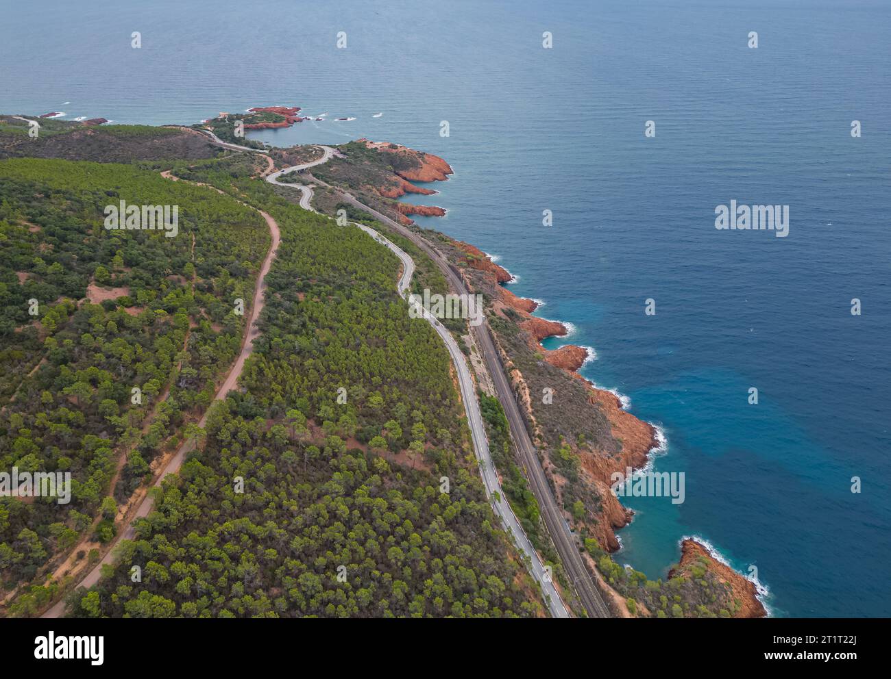Aerial view of the Massif de L'Esterel and a beautiful winding road ...