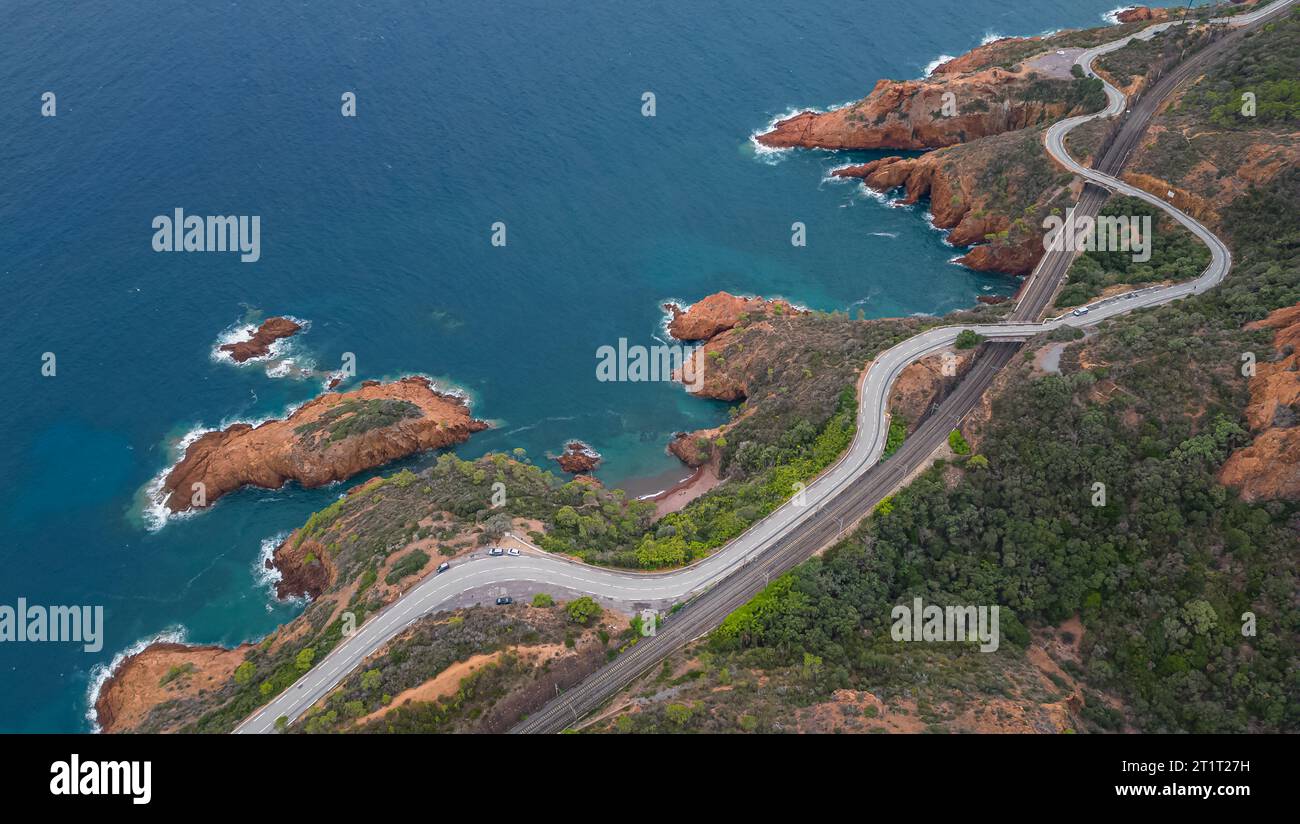Aerial view of the Massif de L'Esterel and a beautiful winding road ...