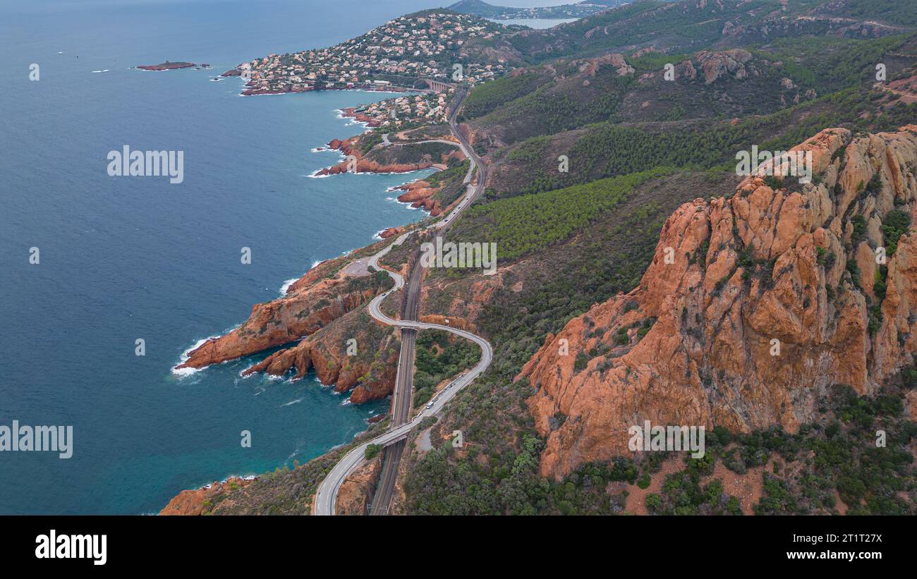 Aerial view of the Massif de L'Esterel and a beautiful winding road ...