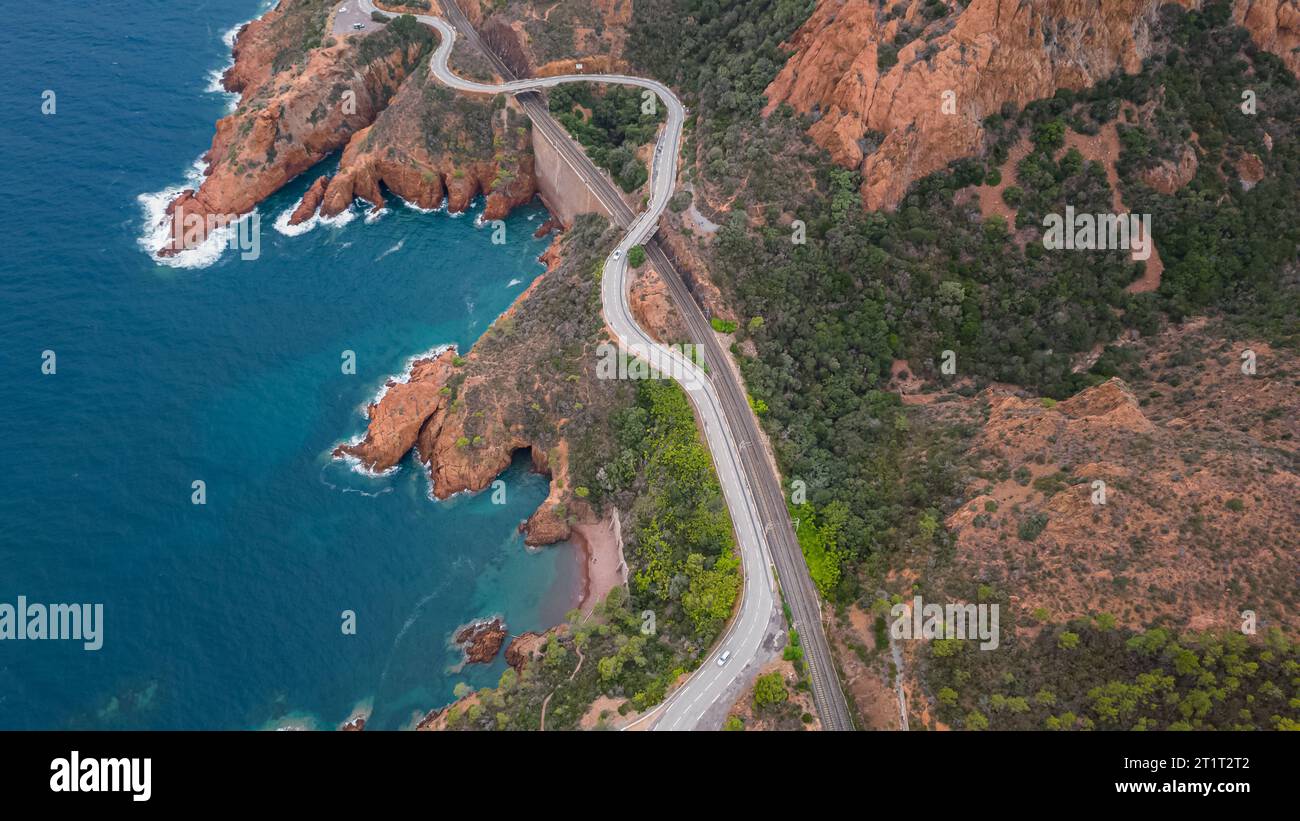 Aerial view of the Massif de L'Esterel and a beautiful winding road ...