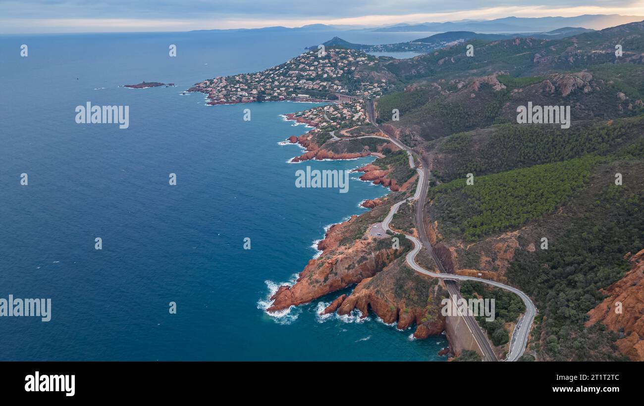 Aerial view of the Massif de L'Esterel and a beautiful winding road ...