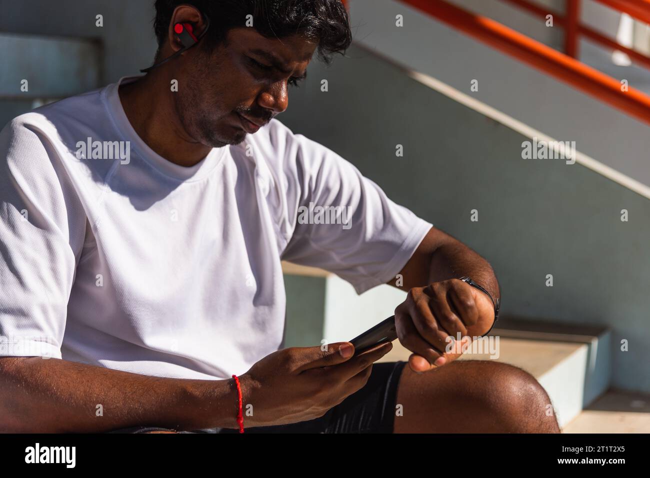 sport runner black man wear modern time smart watch and sync to a ...