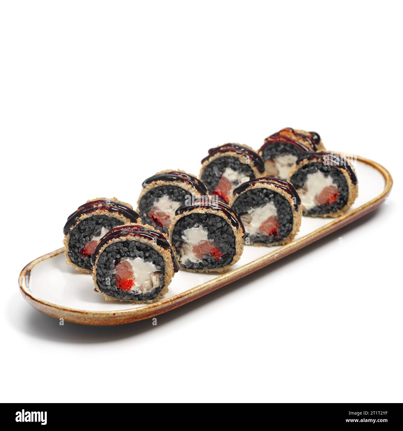 Hot fried sushi rolls with salmon, eel, cheese and black rice. Tempura ...