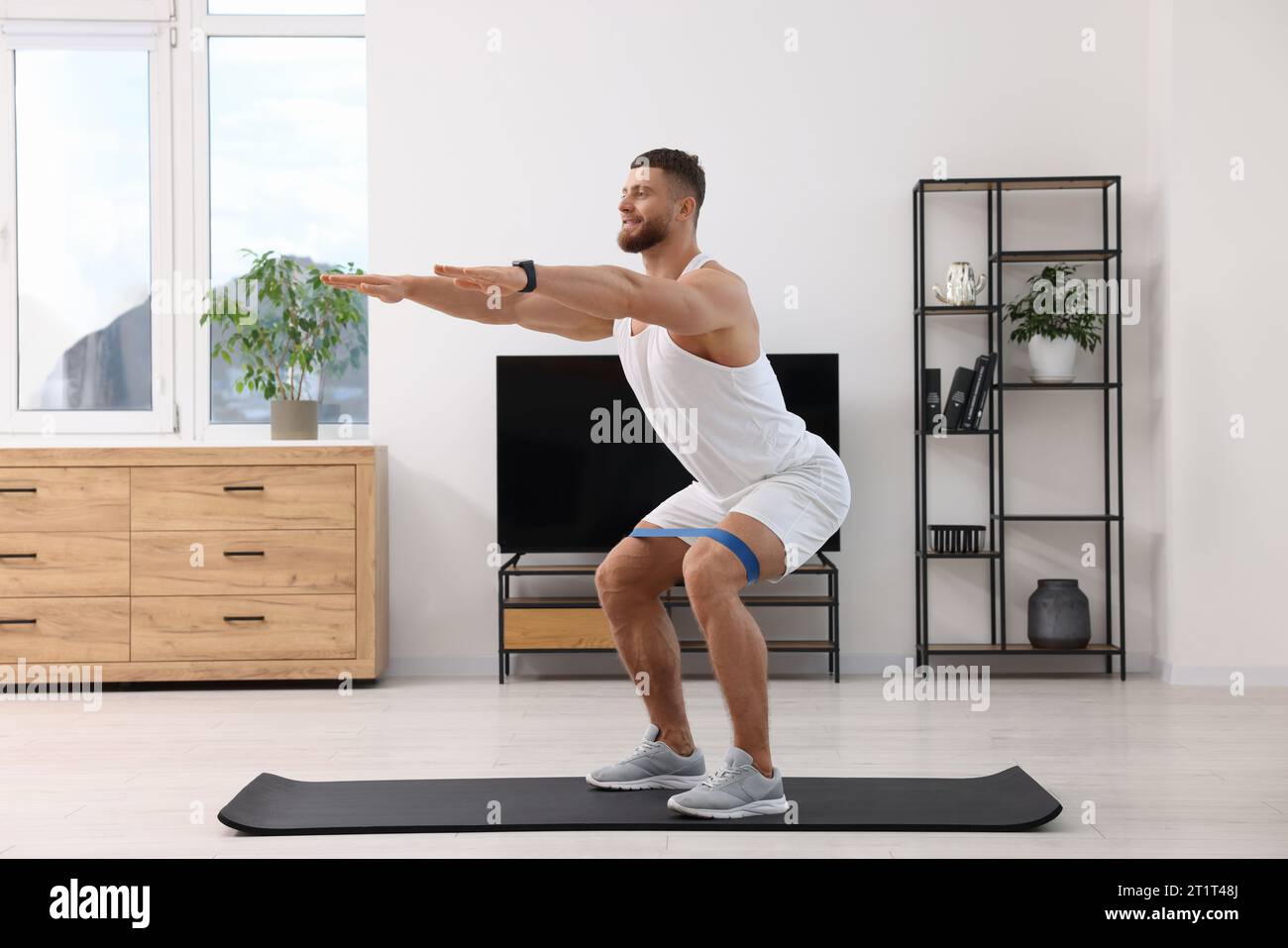 Sportive man training resistance hi-res stock photography and images ...