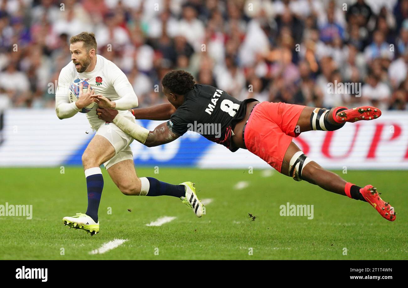 England's Elliot Daly is tackled by Fiji's Viliame Mata during the ...
