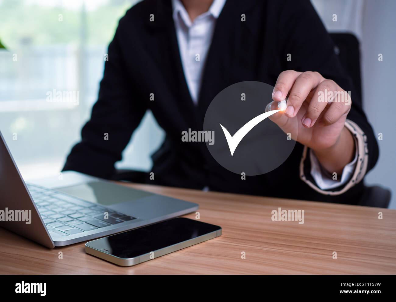 Businesswoman checking items and filling out online survey form ...