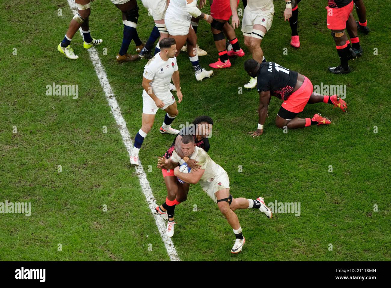 Fiji's Simione Kuruvoli tries to tackle England's Ben Earl, foregeorund ...