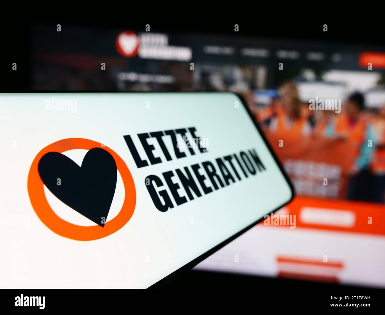 Mobile phone with logo of climate change activist group Letzte ...