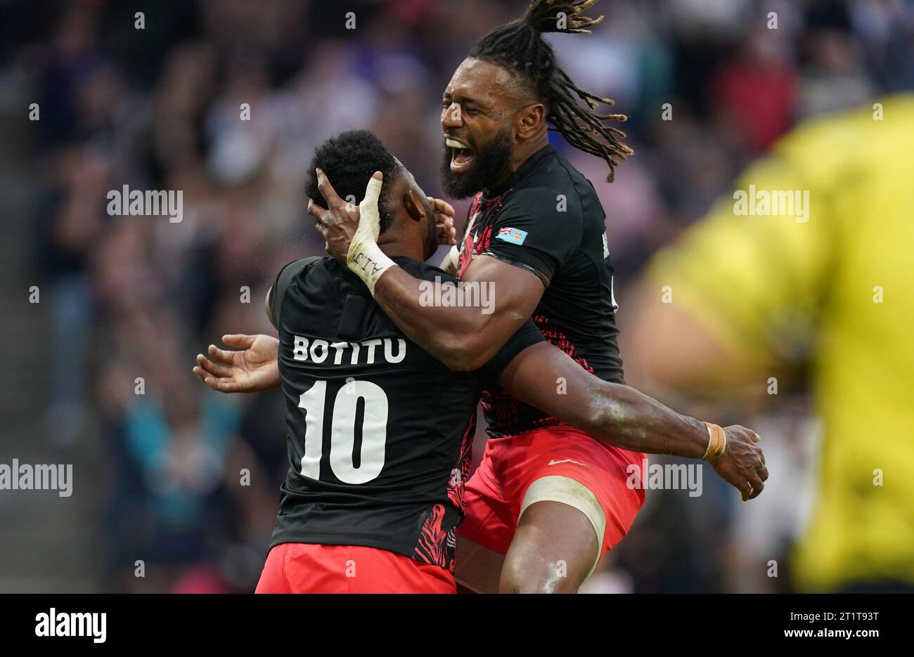 Fiji's Vilimoni Botitu (left) celebrates scoring his sides thirds try ...