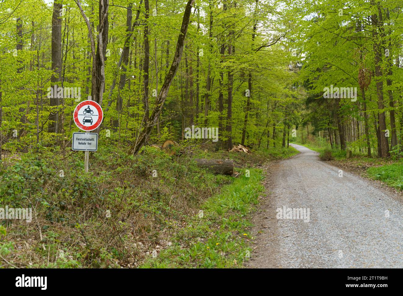 Road sign prohibiting entry of cars and motorcycles into the forest ...