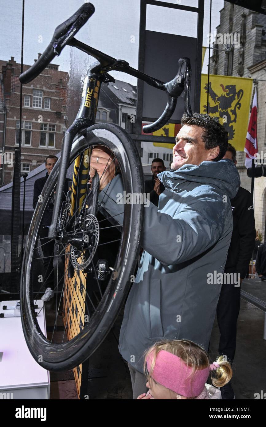 Retiring cyclist Greg Van Avermaet symbolically hangs his bike on a ...