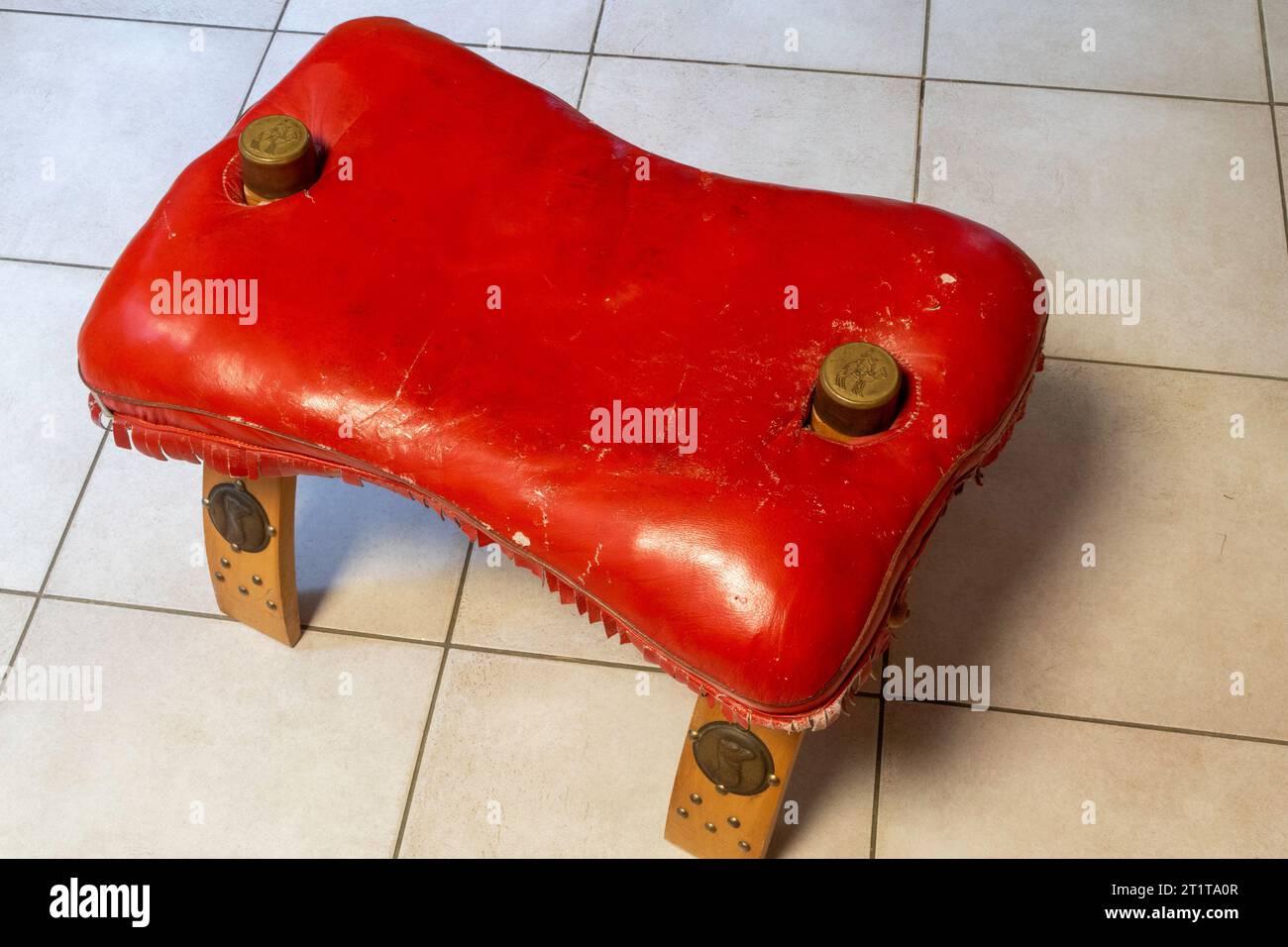 Still life of a vintage red leather camel saddle, USA Stock Photo - Alamy