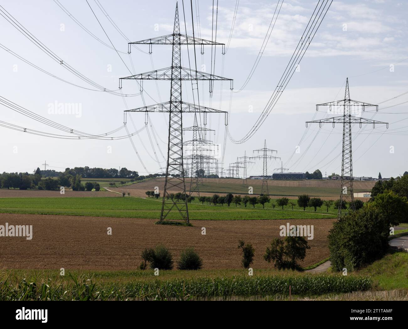 Power transmission lines with several power poles Stock Photo - Alamy